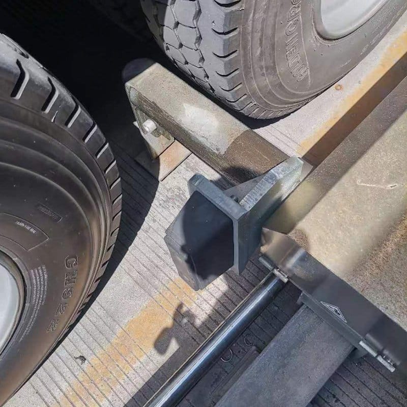Automatic wheel truck limiter (Automatic Locking Wheel Restraint)